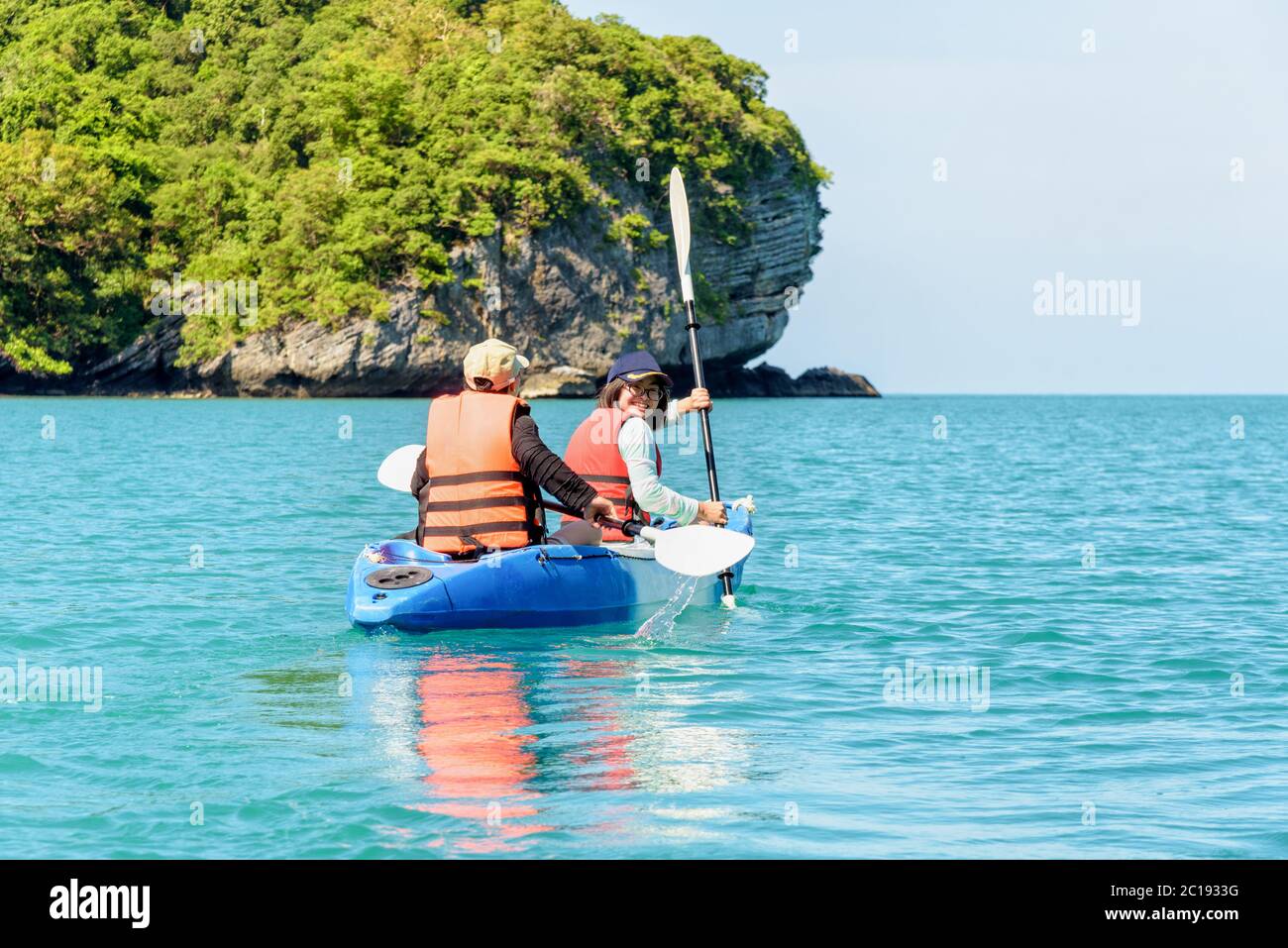 Travel by boat with a kayak Stock Photo - Alamy