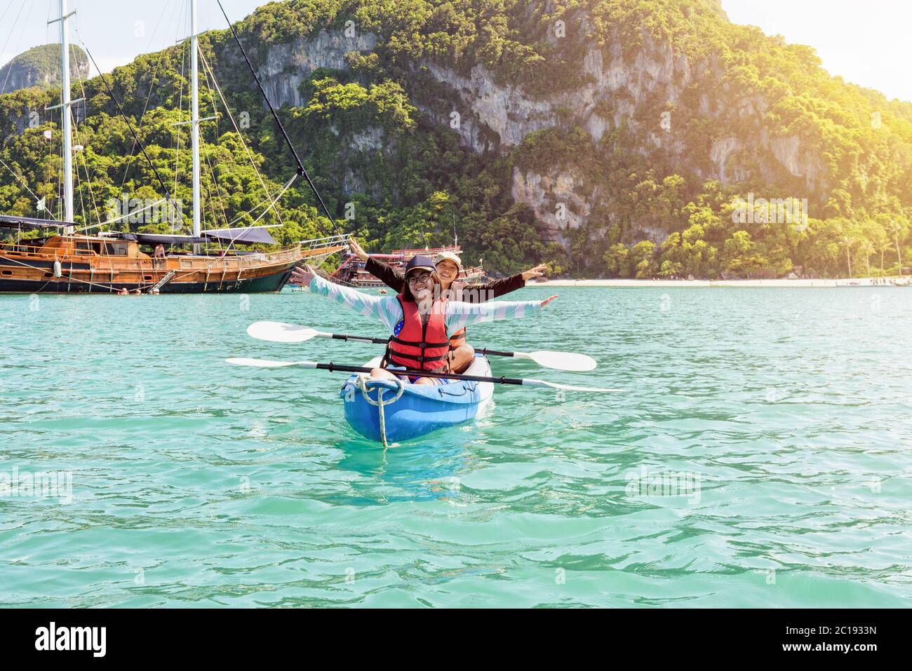Travel by boat with a kayak Stock Photo - Alamy