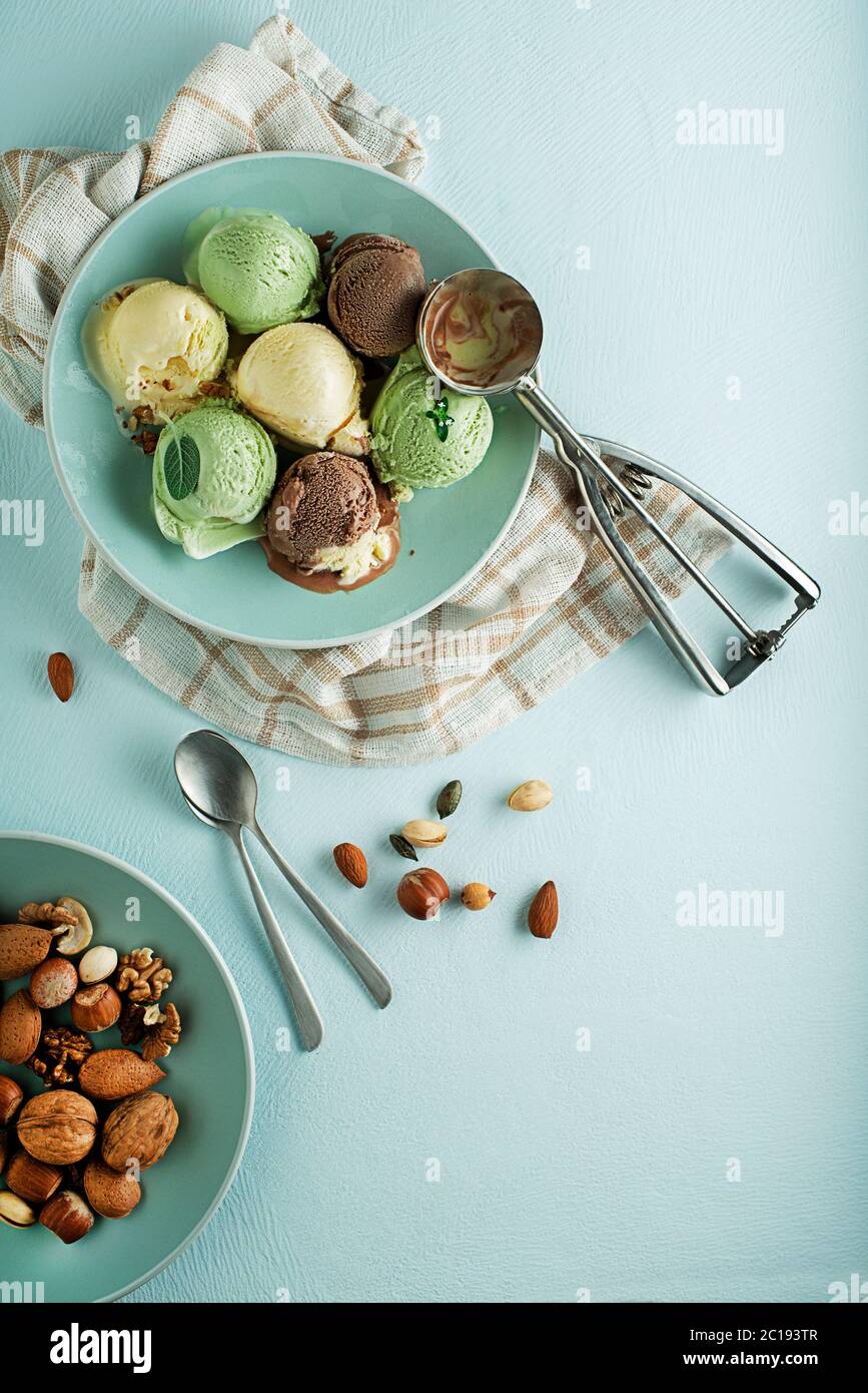 Set of soft ice cream scoops of different flavours with chocolate and ...