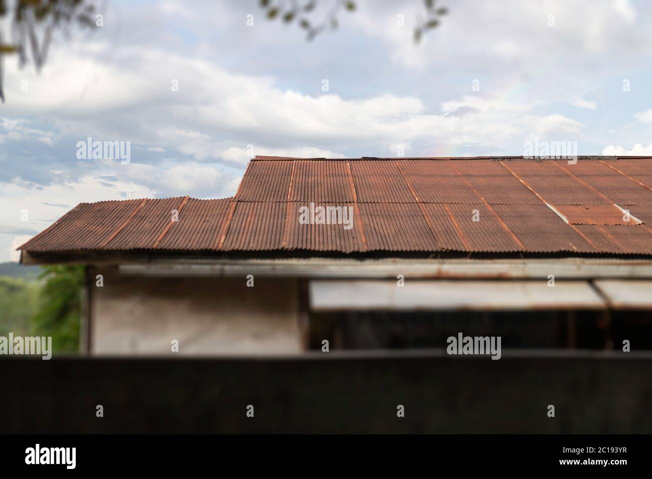 Vintage house roof with cloudy sky, stock photo Stock Photo - Alamy