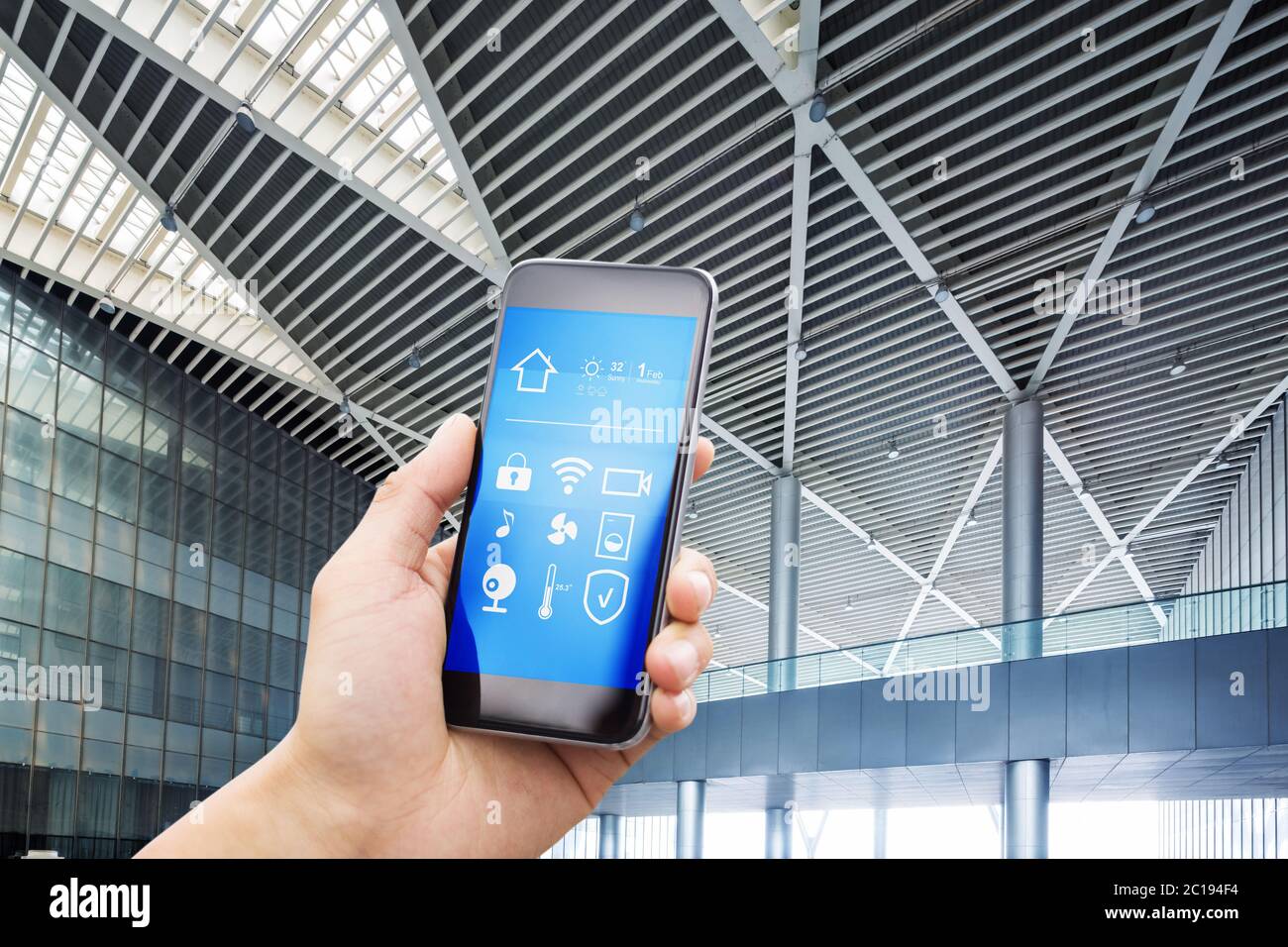 smart phone with smart home with modern hall Stock Photo - Alamy