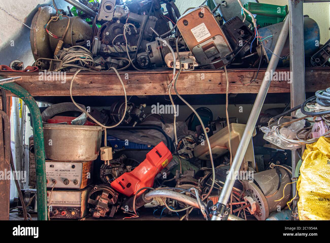 A many old components of damaged electrical appliance ready for repair ...