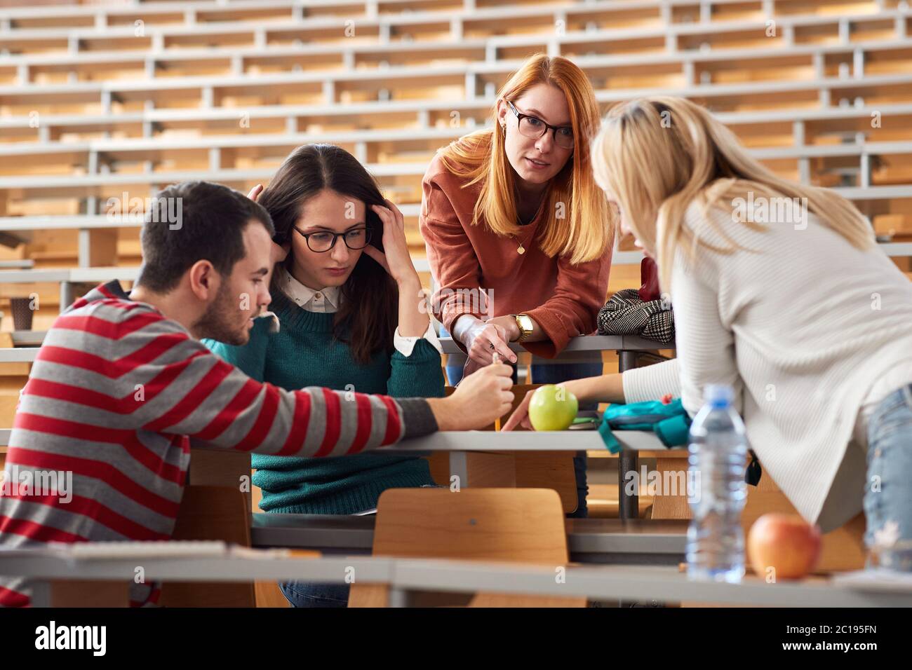 Comparing notes attractive young hi-res stock photography and images ...