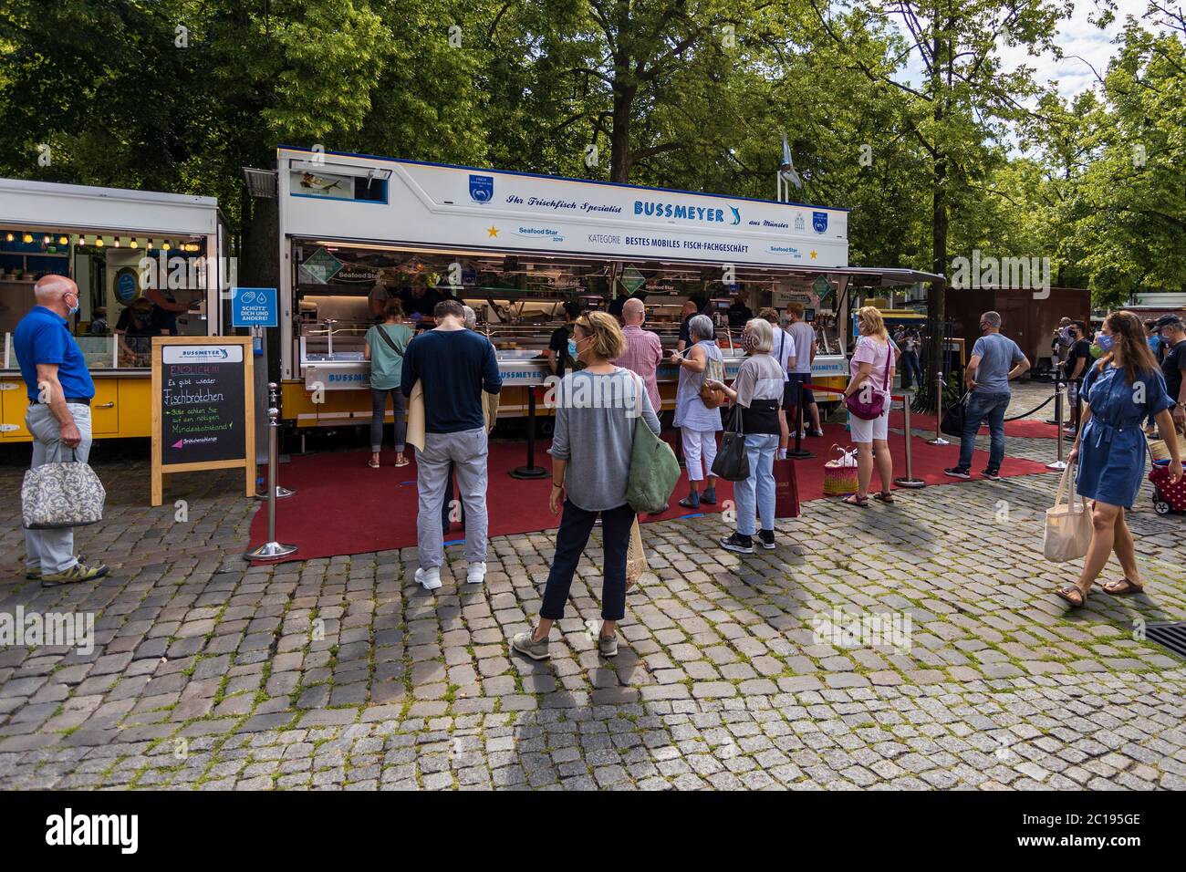 Social distancing during the coronavirus crisis, shopping at the farmer ...
