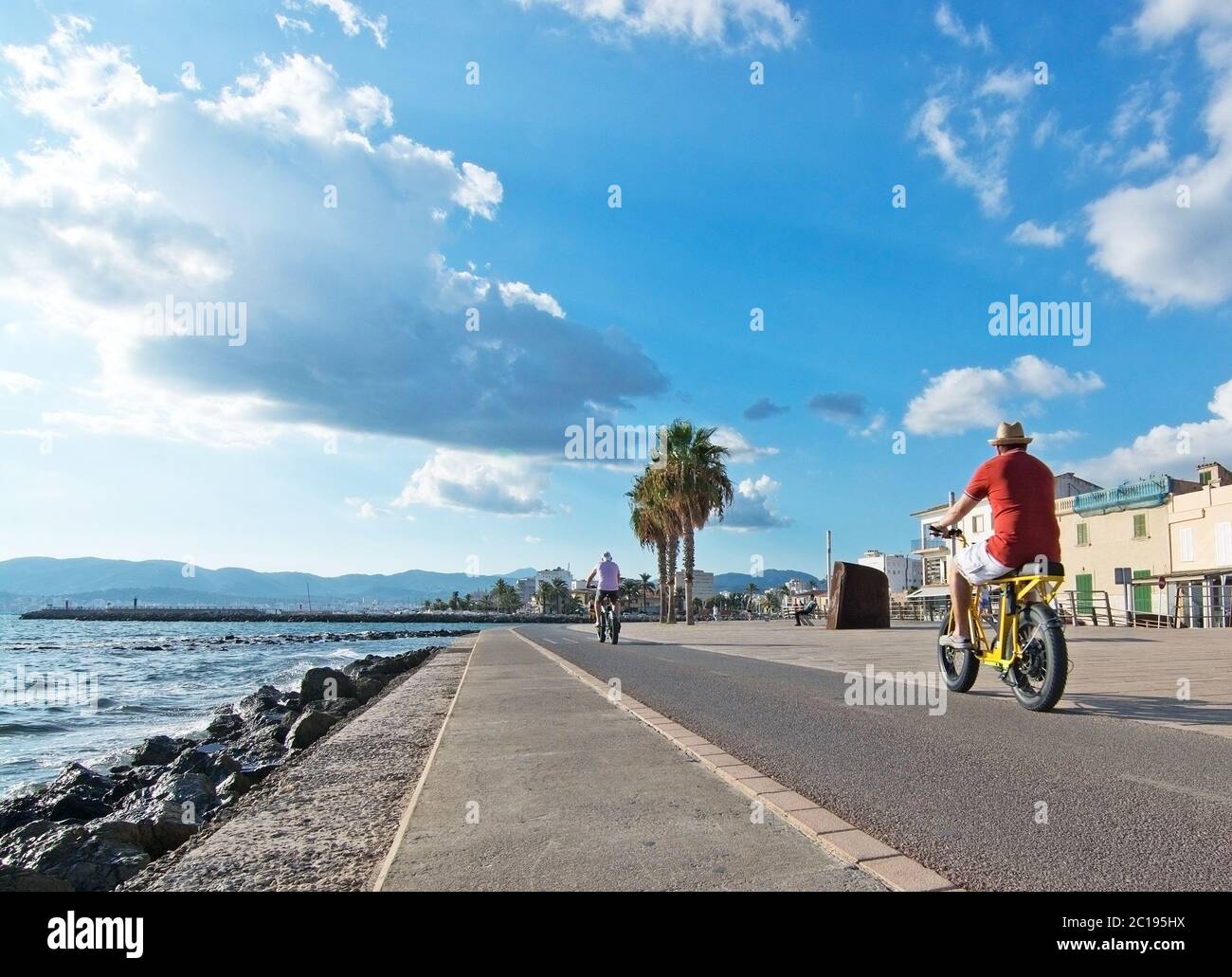 People along the Portixol promenade Stock Photo - Alamy