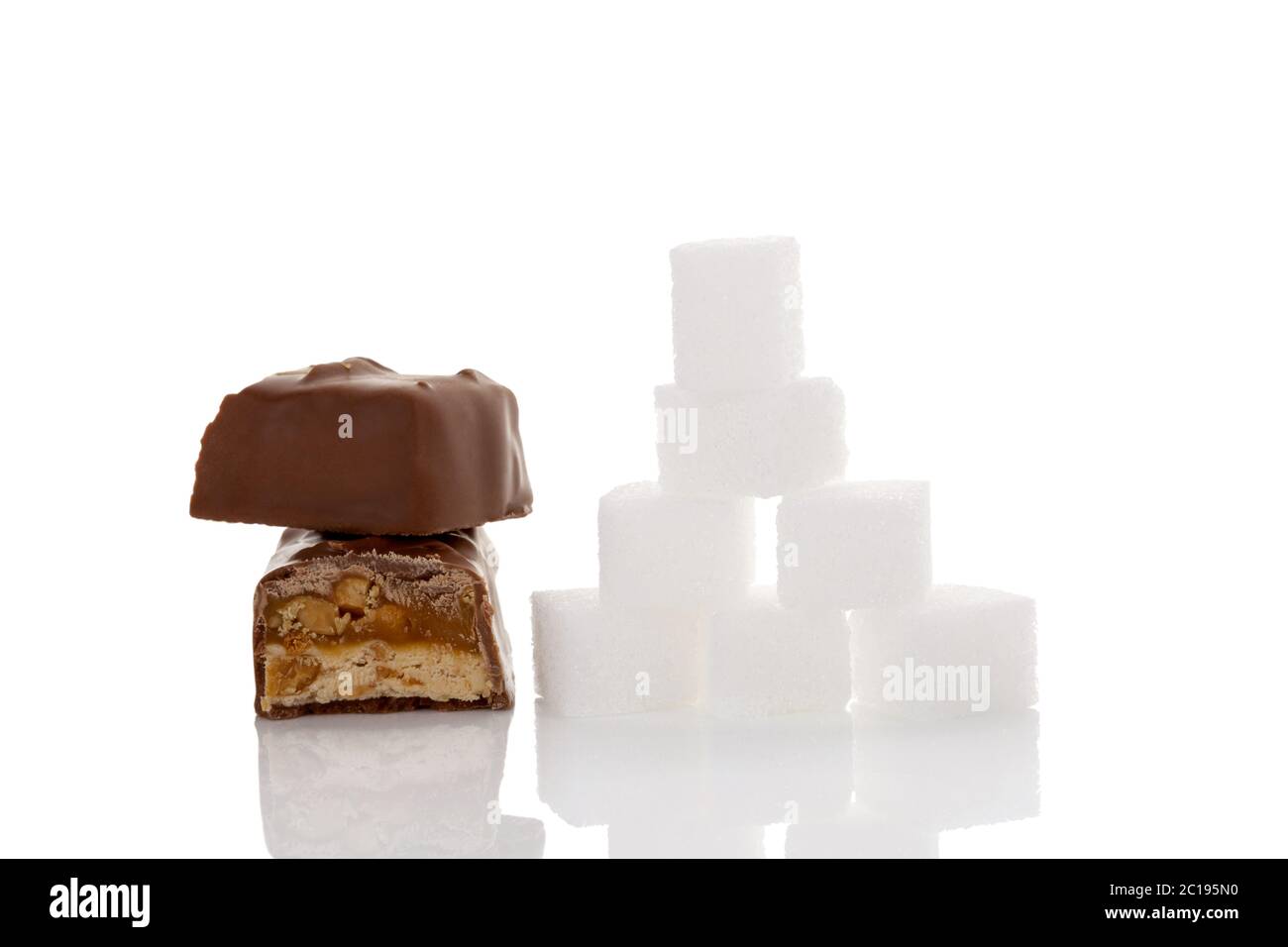 Chocolate bar and sugar cubes Stock Photo - Alamy