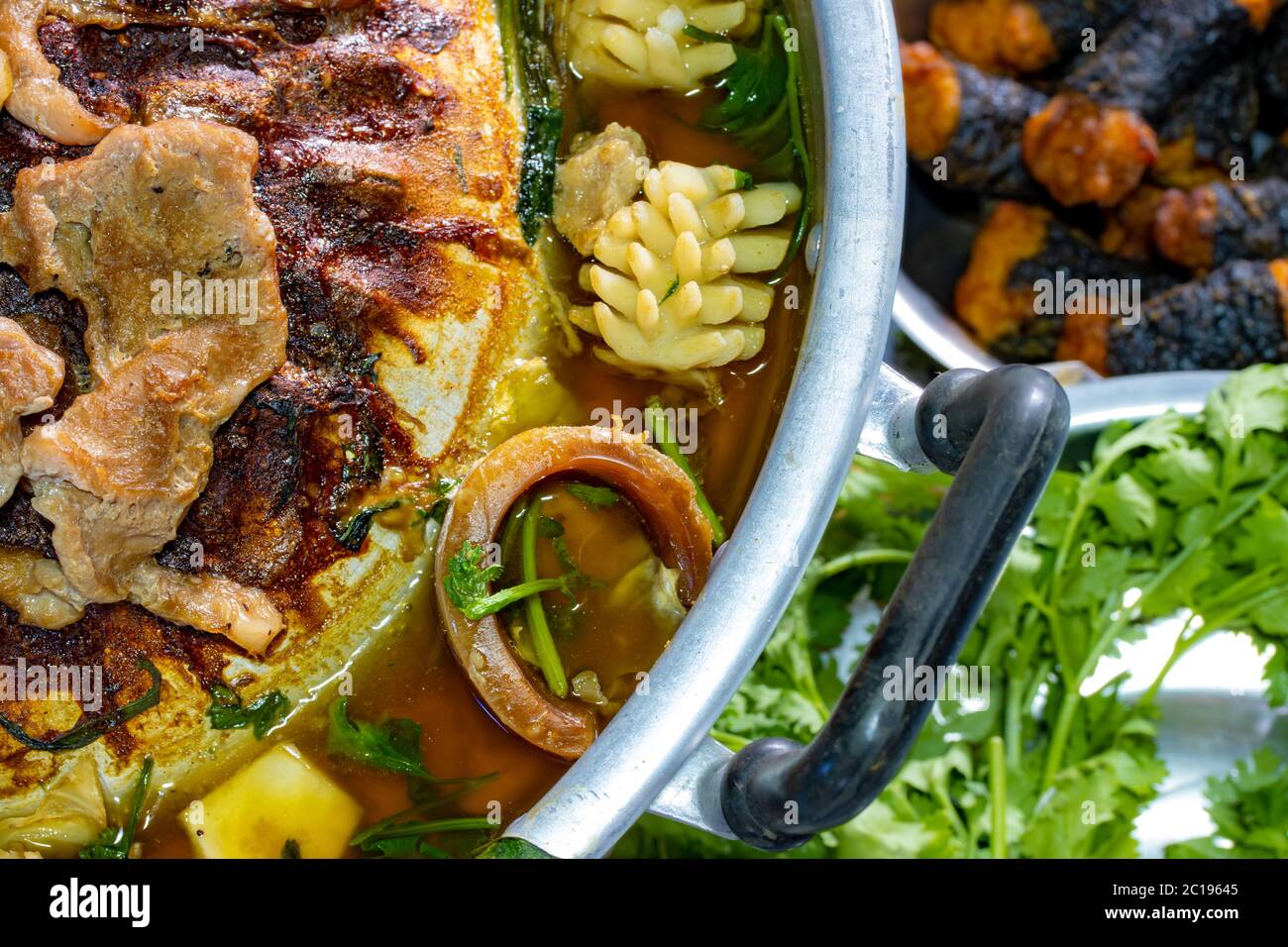 A preparation of roasted meat with sauce of vegetable on Hot Pot - Mu ...