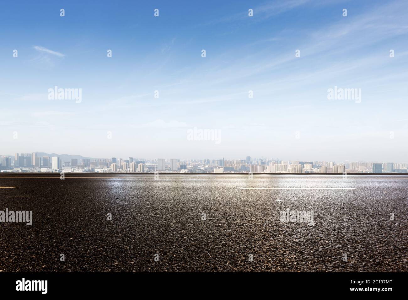 emtpy asphalt road with modern cityscape Stock Photo - Alamy