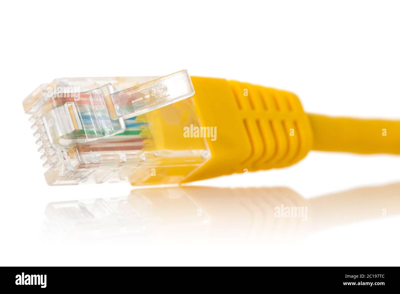 Yellow internet cable isolated on white Stock Photo - Alamy
