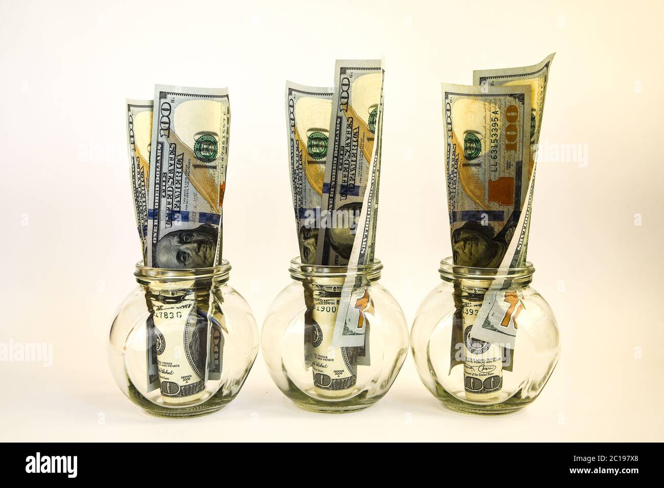 100 dollar bills jar hi-res stock photography and images - Alamy