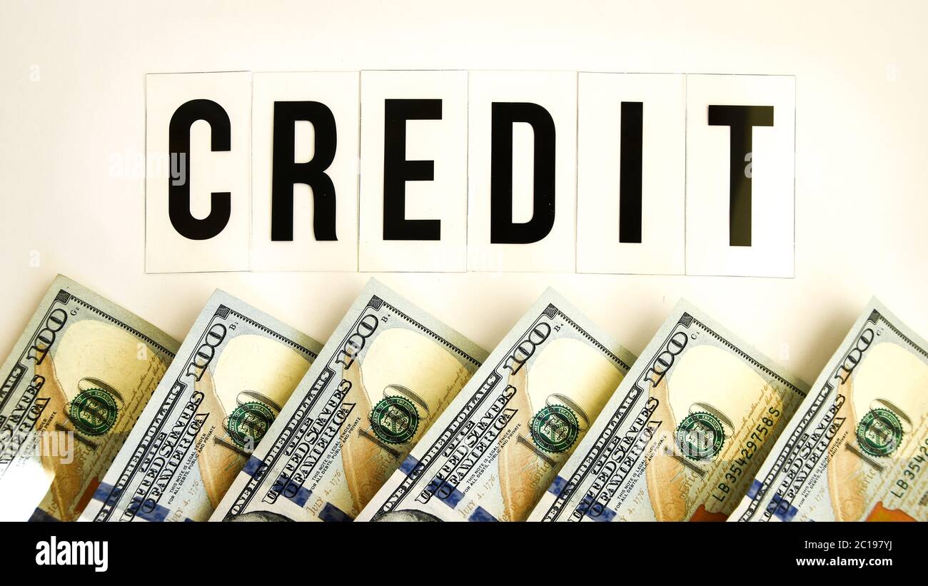 Word CREDIT with one hundred dollar bill on white background Stock ...