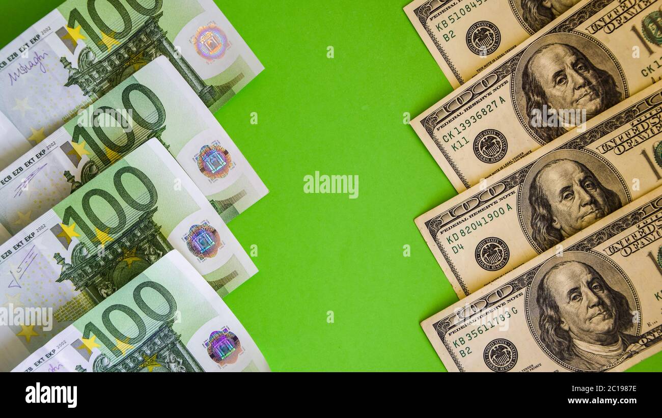 US Dollar and Euro, Euro banknotes close up. Several hundred euro ...