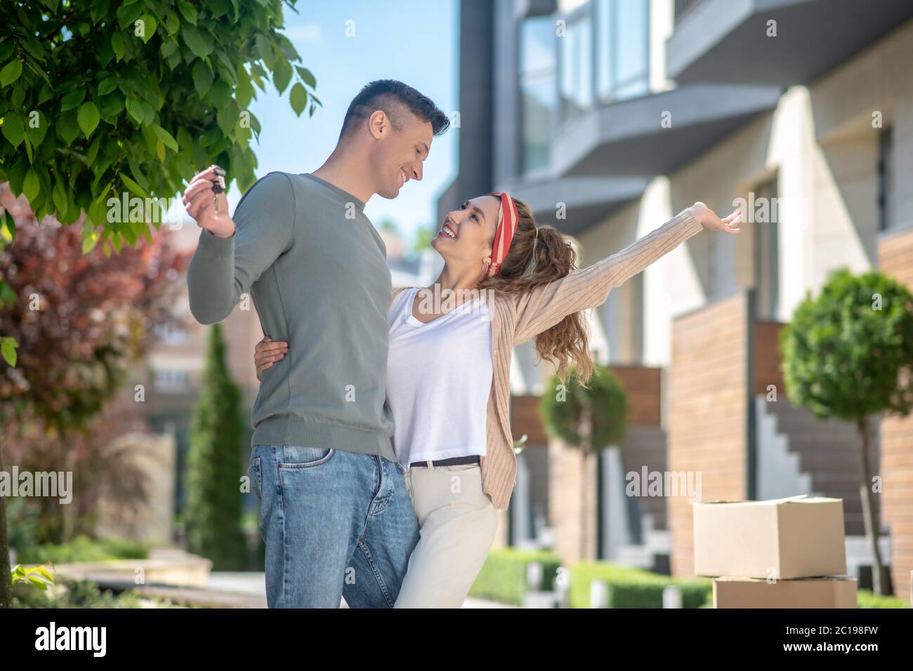 Happy young couple feeling amazing after moving to a new house Stock ...