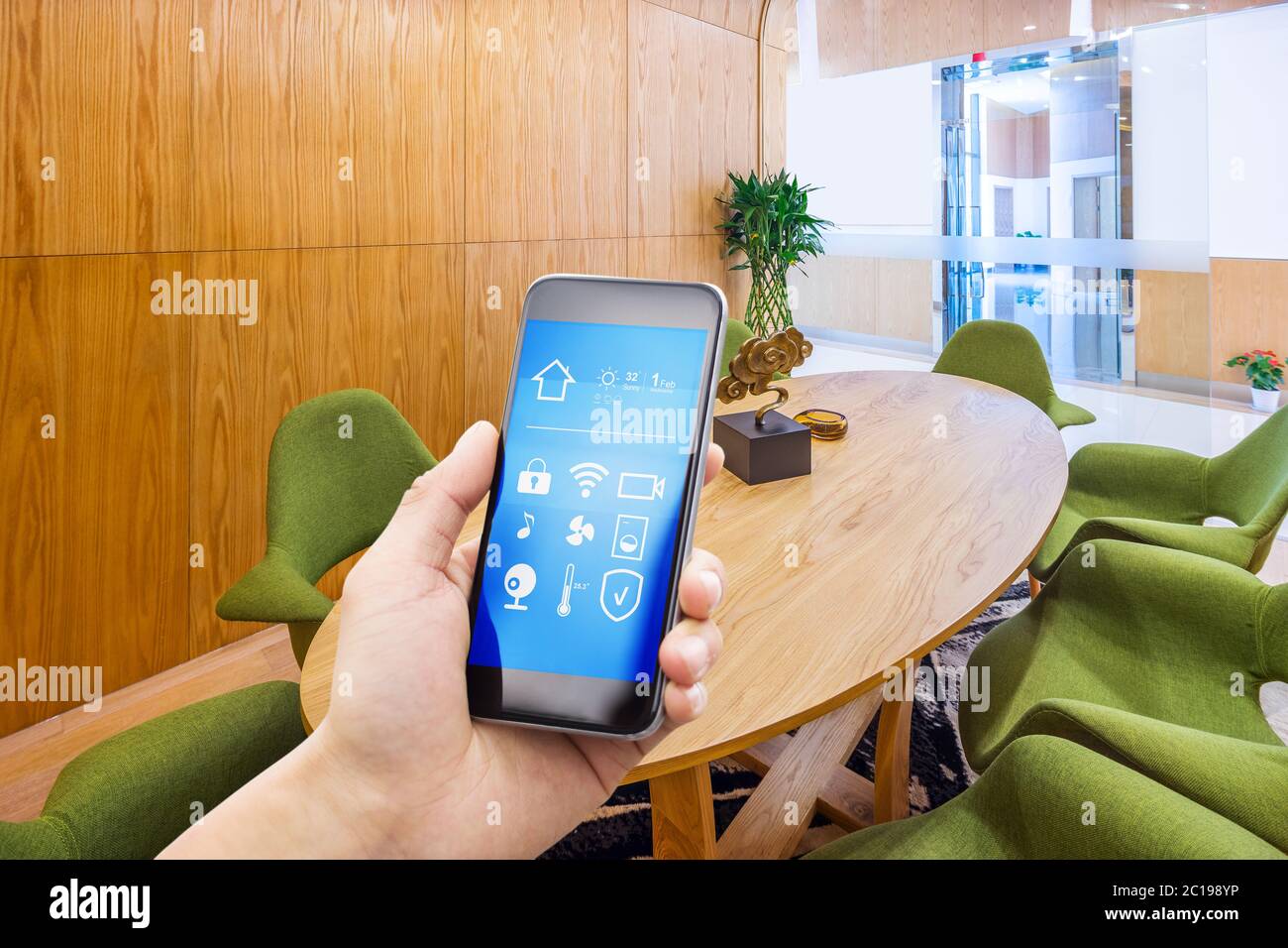 smart phone with smart home with modern dining room Stock Photo - Alamy