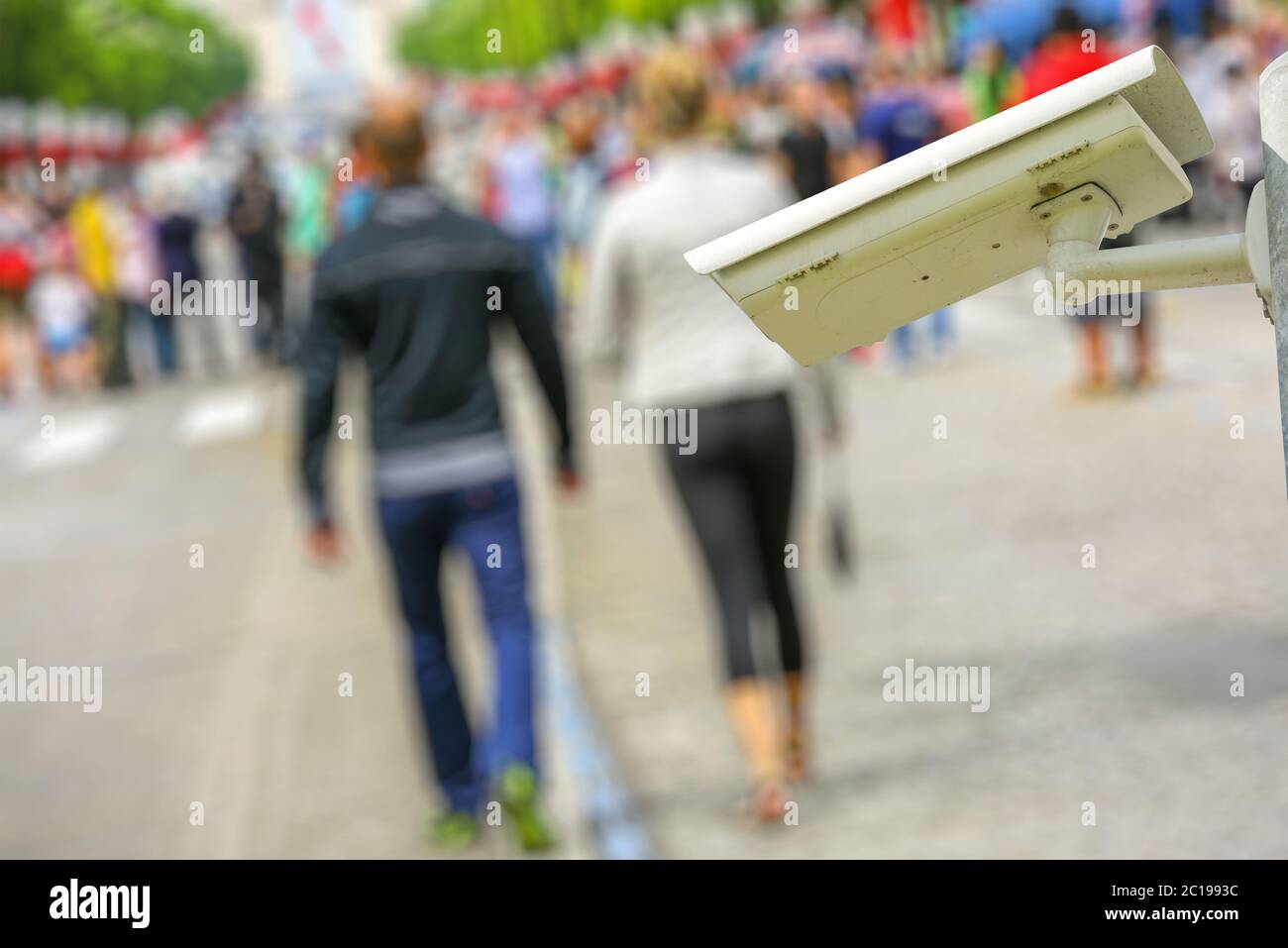 security CCTV camera or surveillance system with lovers and the crowd ...
