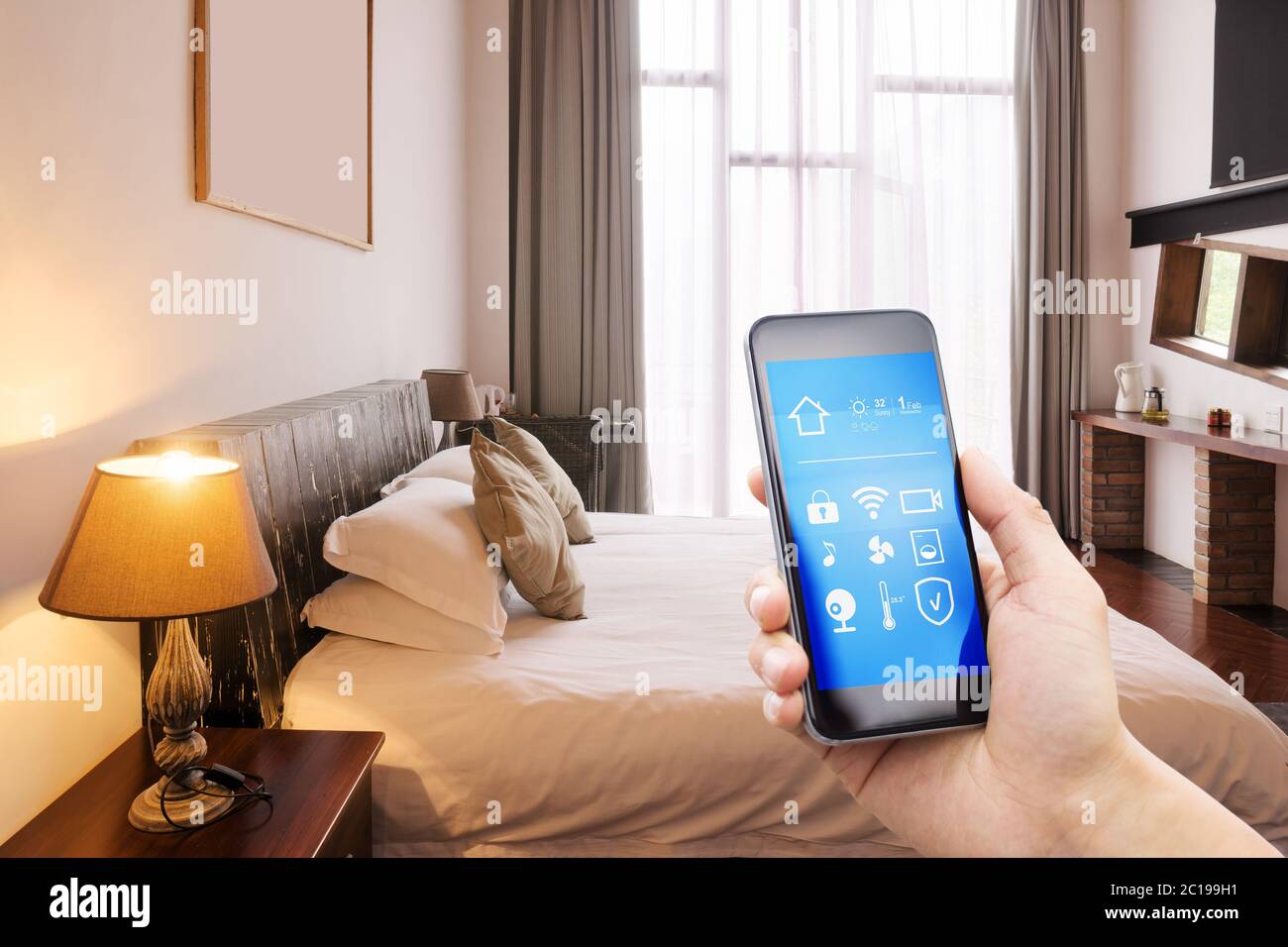 smart phone with smart home with modern bedroom Stock Photo - Alamy