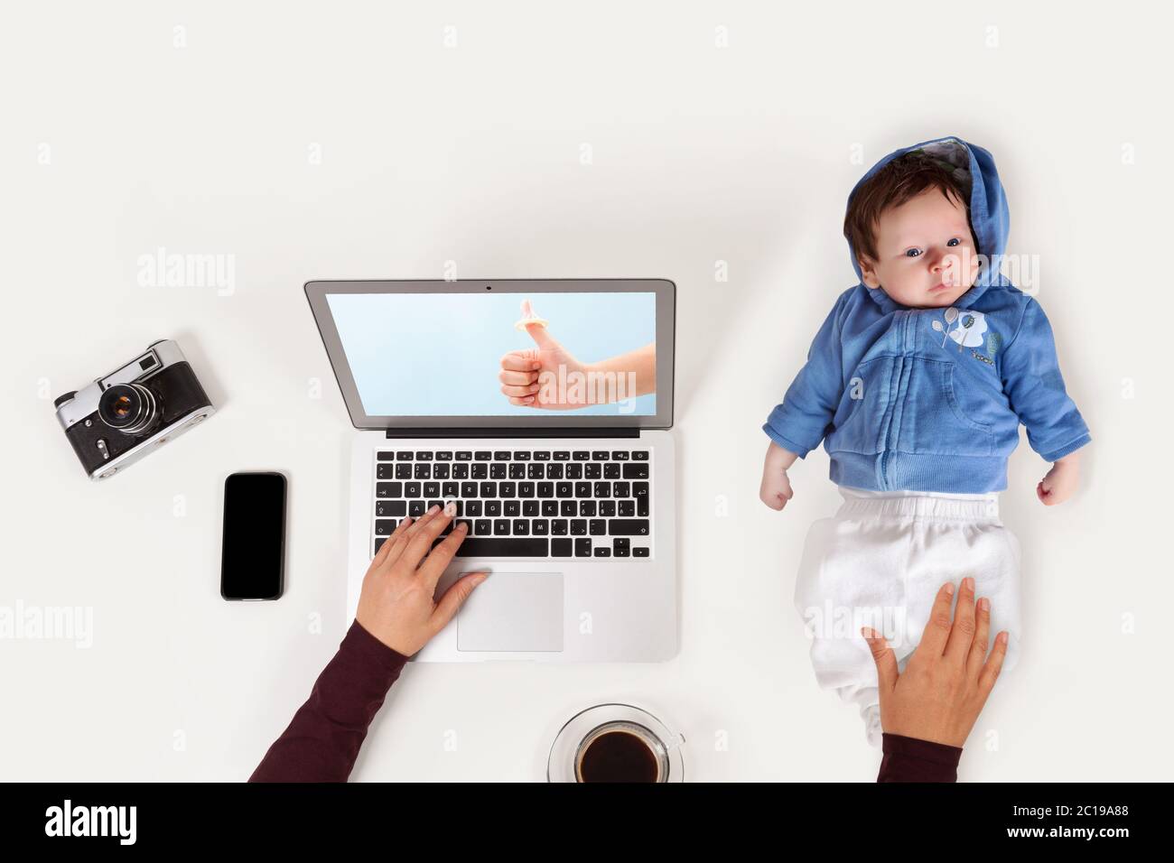 Working mother notebook hi-res stock photography and images - Alamy