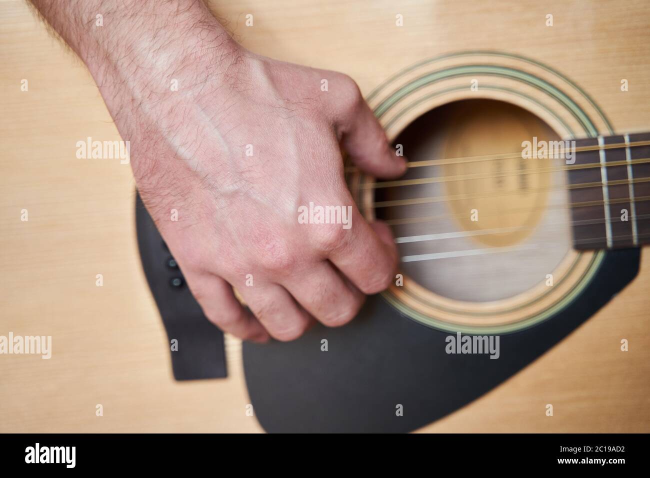 Plucking an instrument horizontal hi-res stock photography and images ...
