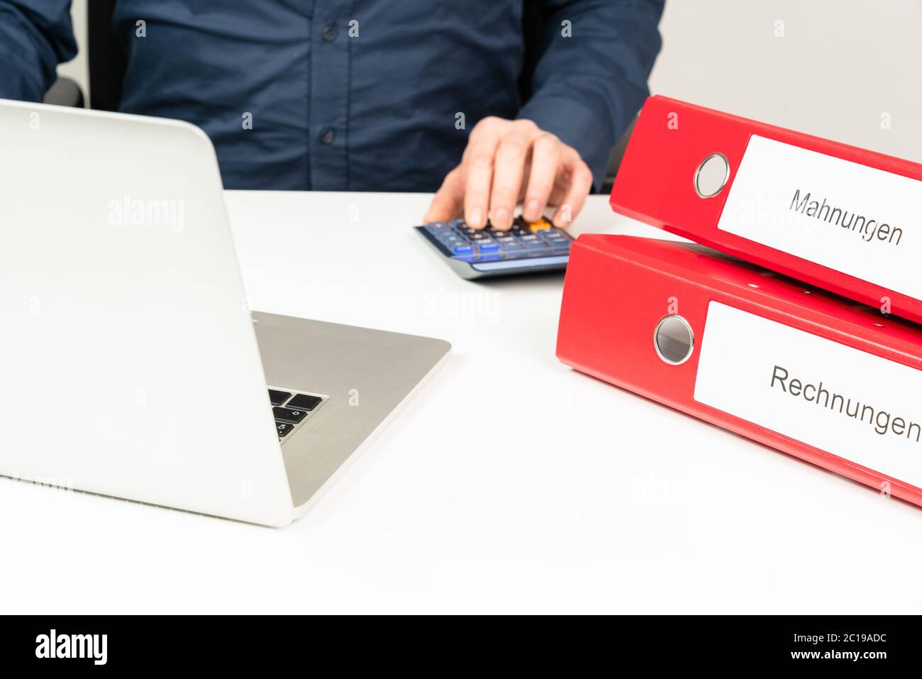 Businessman file folders on desk hi-res stock photography and images ...