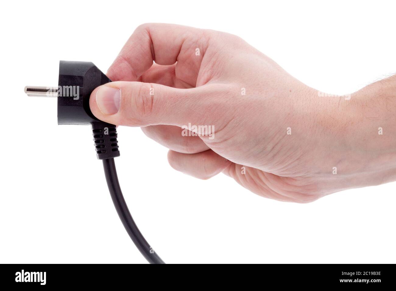 Hand holding electric plug Stock Photo - Alamy