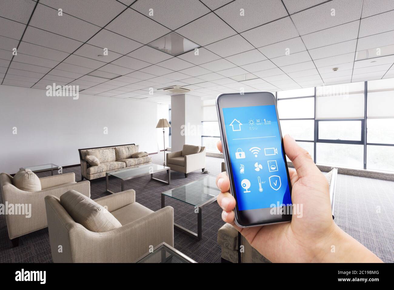 smart phone with smart home with modern living room Stock Photo - Alamy