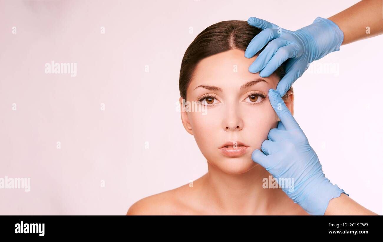 Aesthetic skin consultation. Patient and doctor gloves. Cosmetology ...
