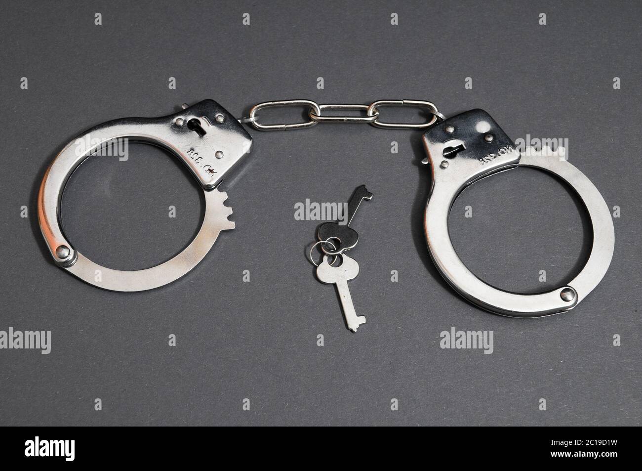 Handcuffing hi-res stock photography and images - Alamy