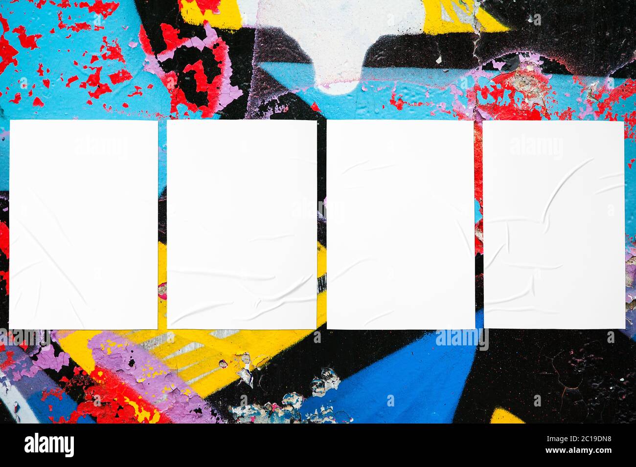 close up of colorful messy painted urban wall texture with four ...