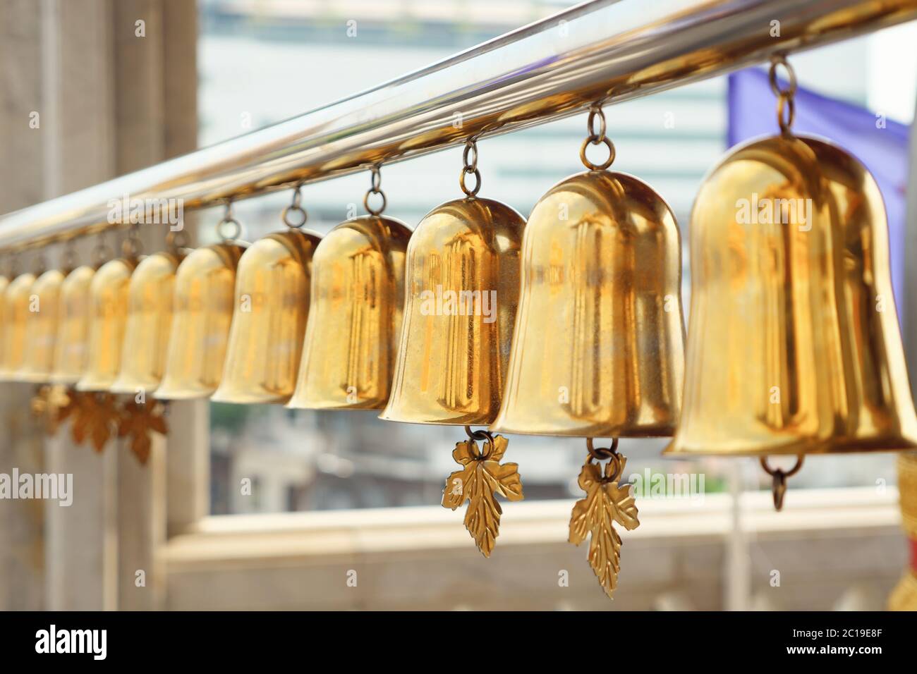 Buddhism. beautiful golden traditional Buddhist bells in Bangkok close ...