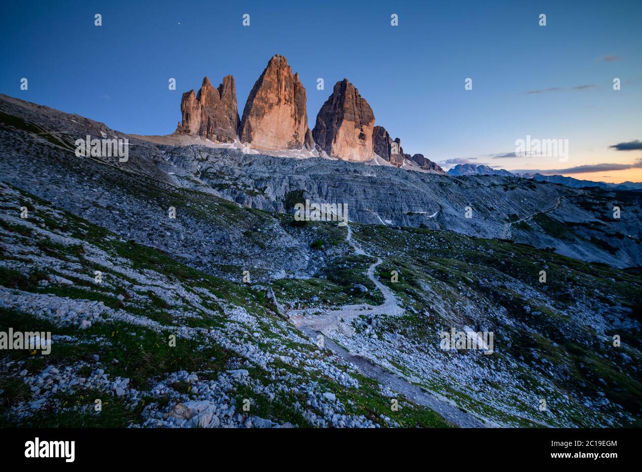 The Three Peaks of Lavaredo (Tre Cime di Lavaredo) at sunset, Dolomites ...