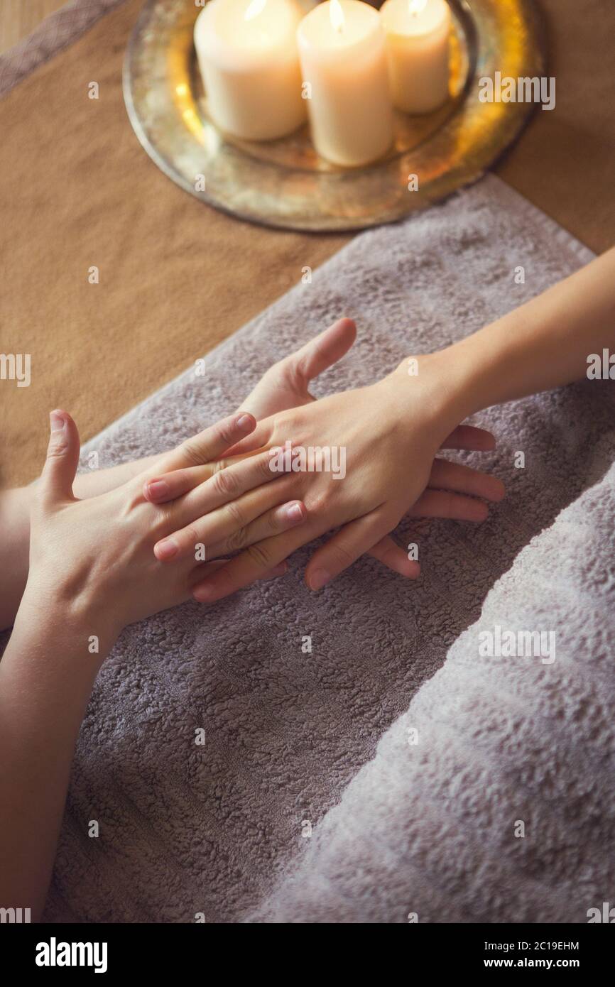 Hand massage at spa Stock Photo - Alamy