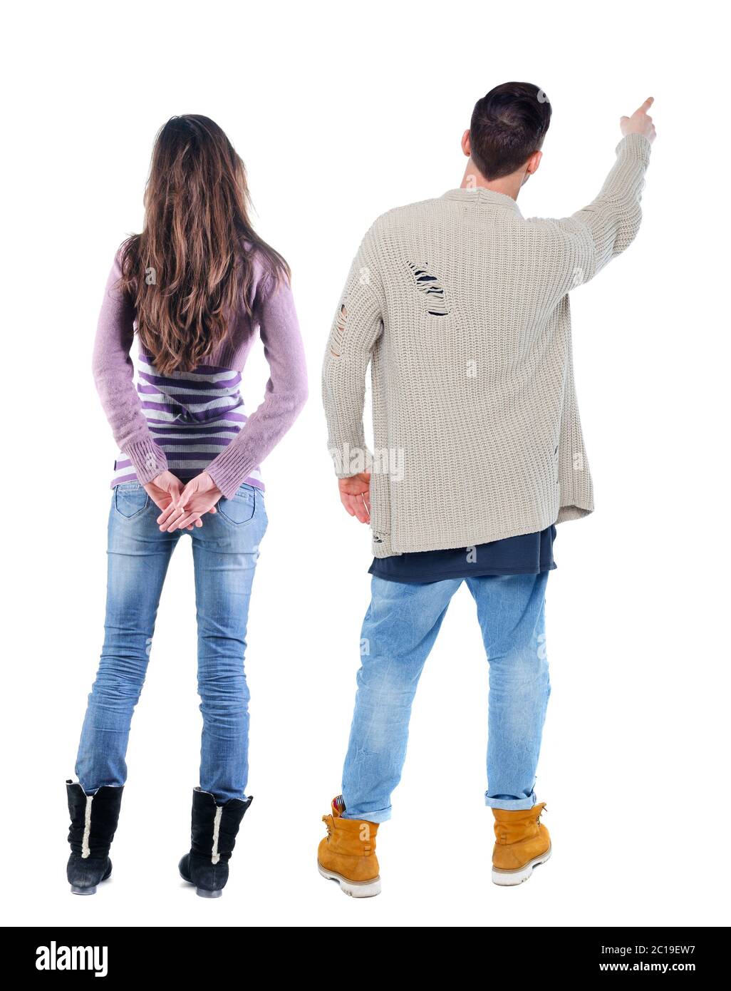 Back view of couple in sweater pointing. Rear view people collection ...