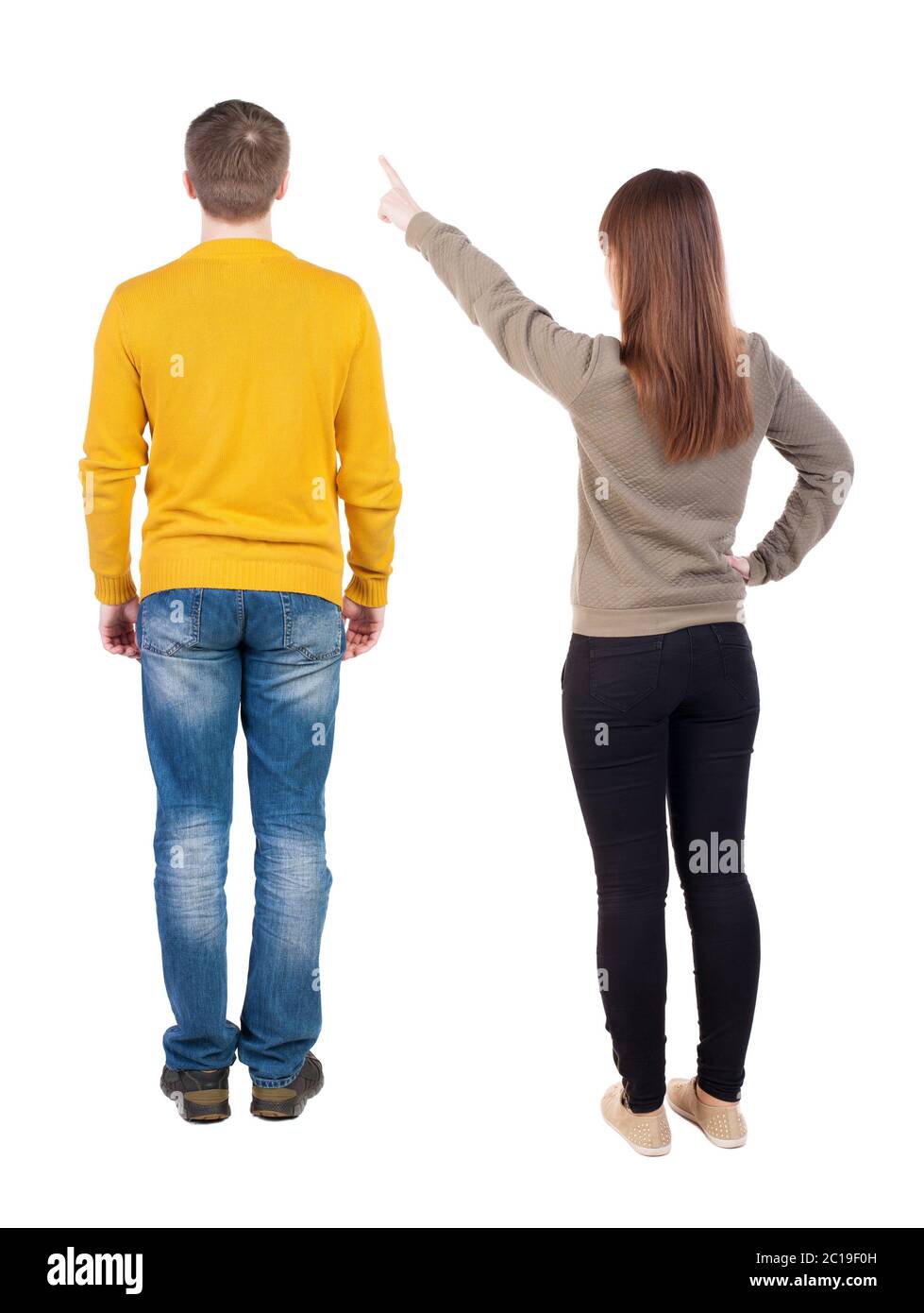 Back view of couple in sweater pointing. Rear view people collection ...