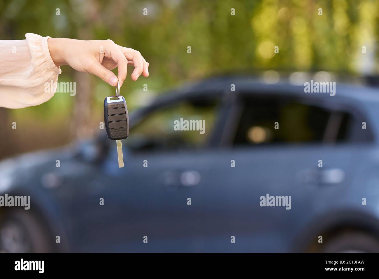 Car key handover hi-res stock photography and images - Alamy