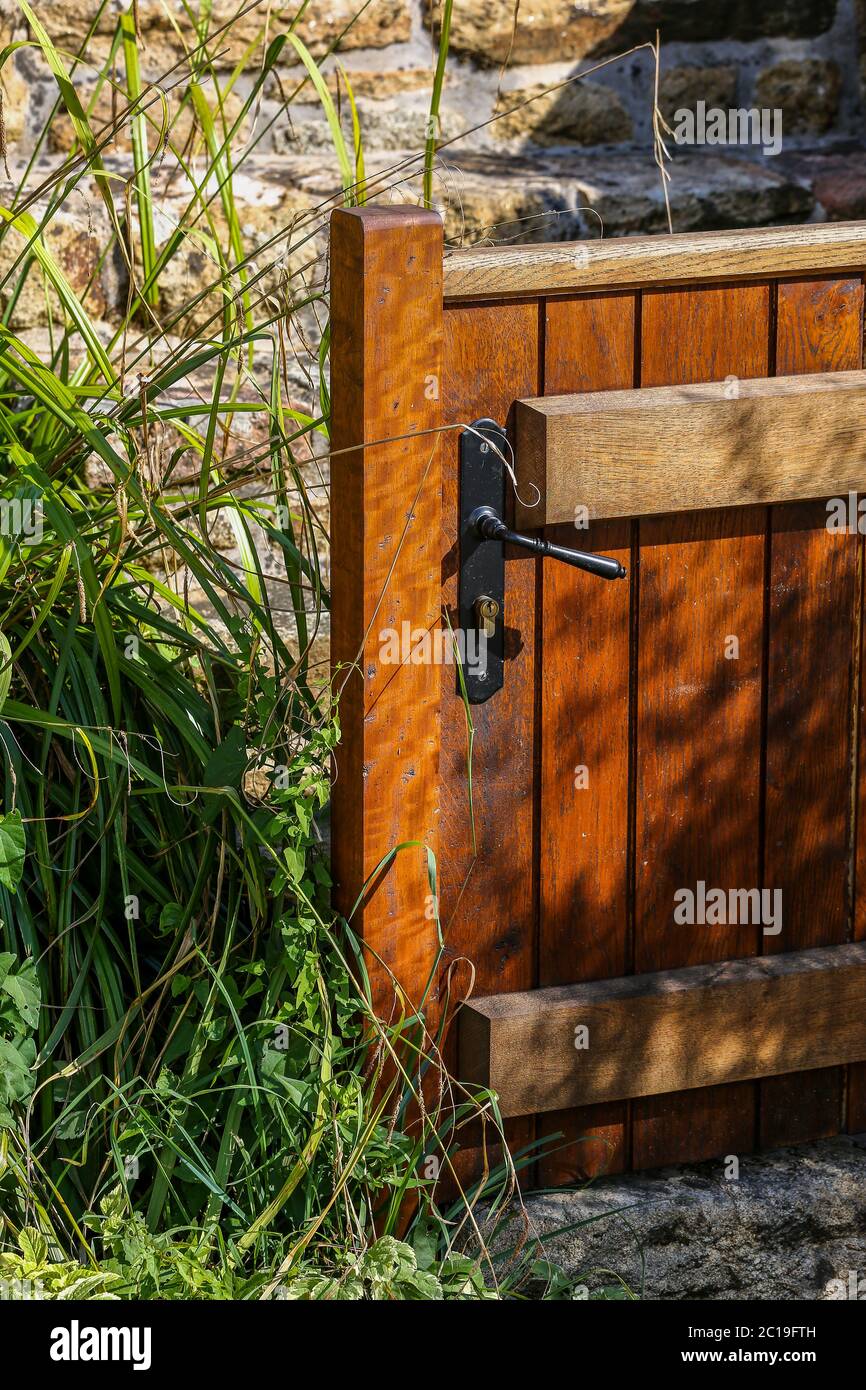 Close-up of brown wood gate Stock Photo - Alamy