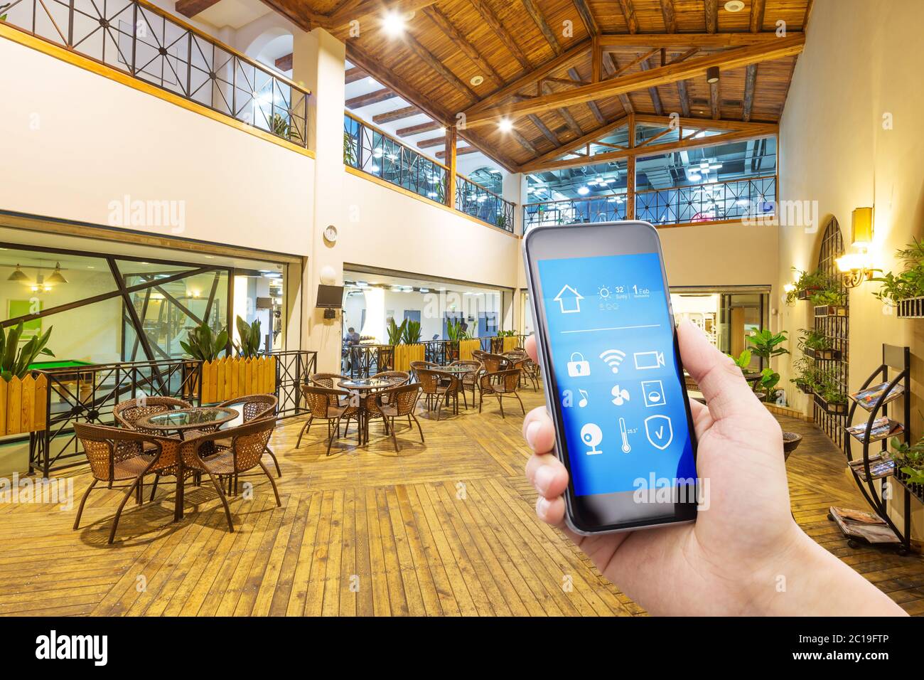 smart phone with smart home and dining room Stock Photo - Alamy