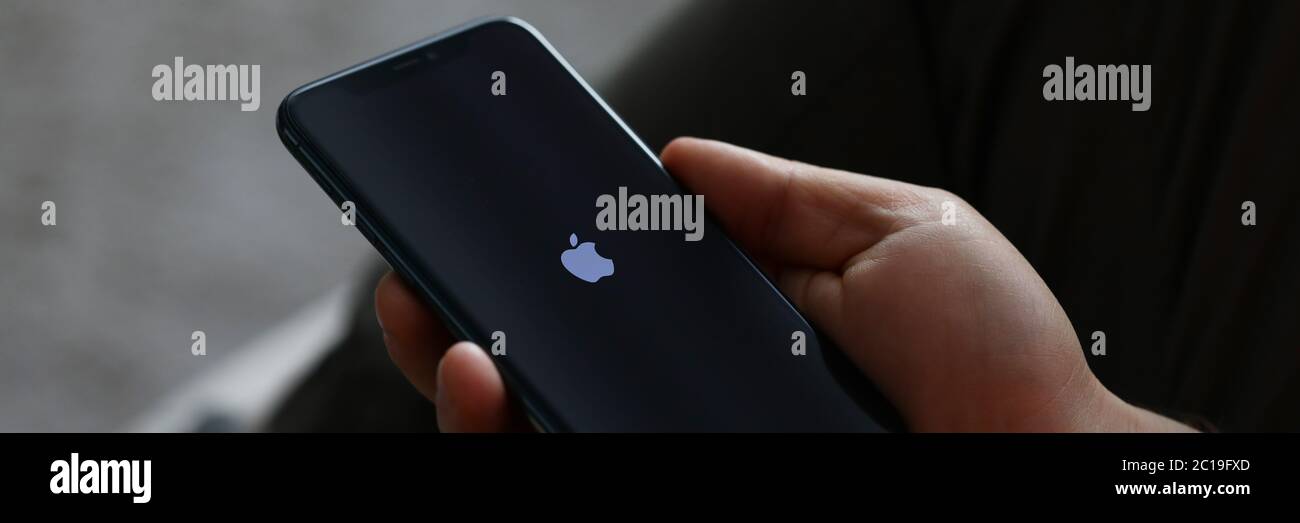 Male hand hold Apple iphone pro Stock Photo - Alamy