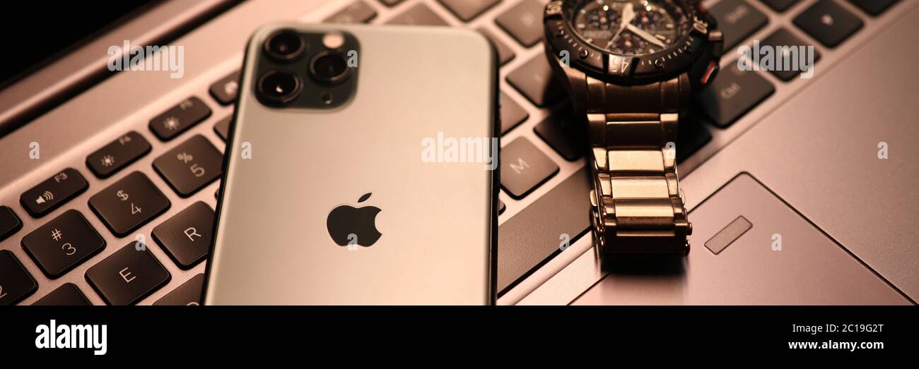 Apple iphone pro on laptop keyboard Stock Photo - Alamy