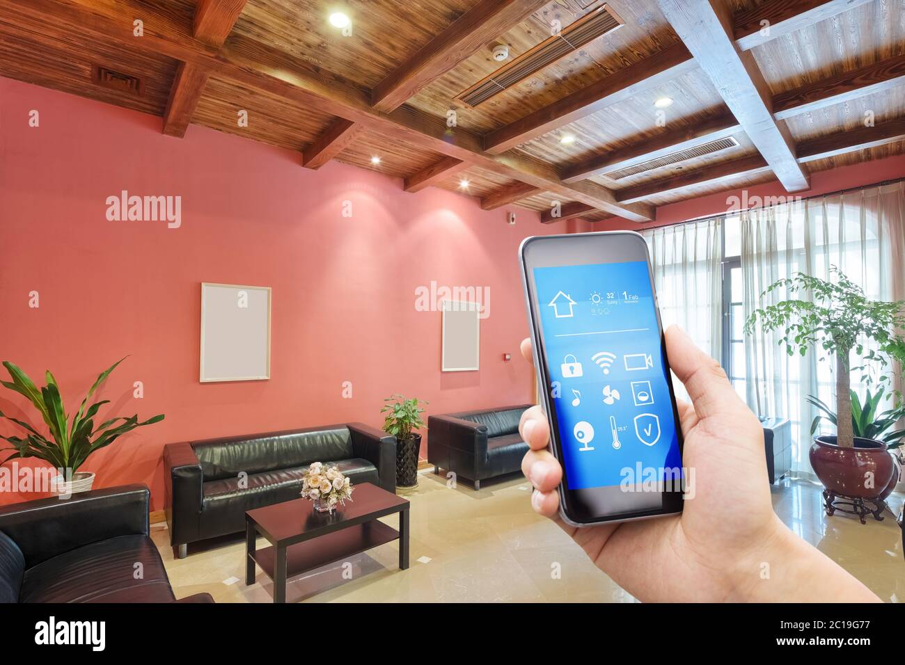 smart phone with smart home with modern lounge Stock Photo - Alamy