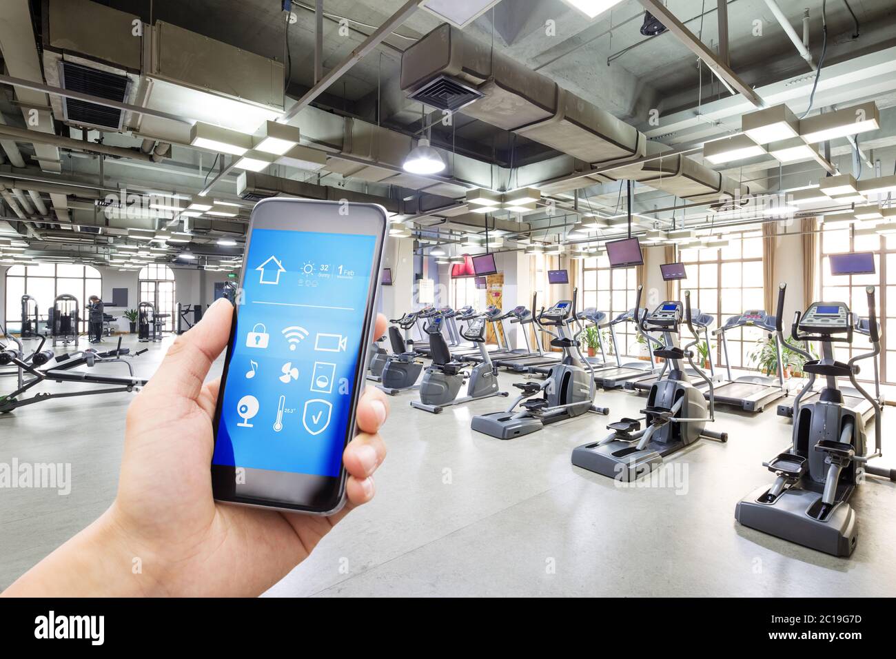 smart phone with smart home with modern gym Stock Photo - Alamy