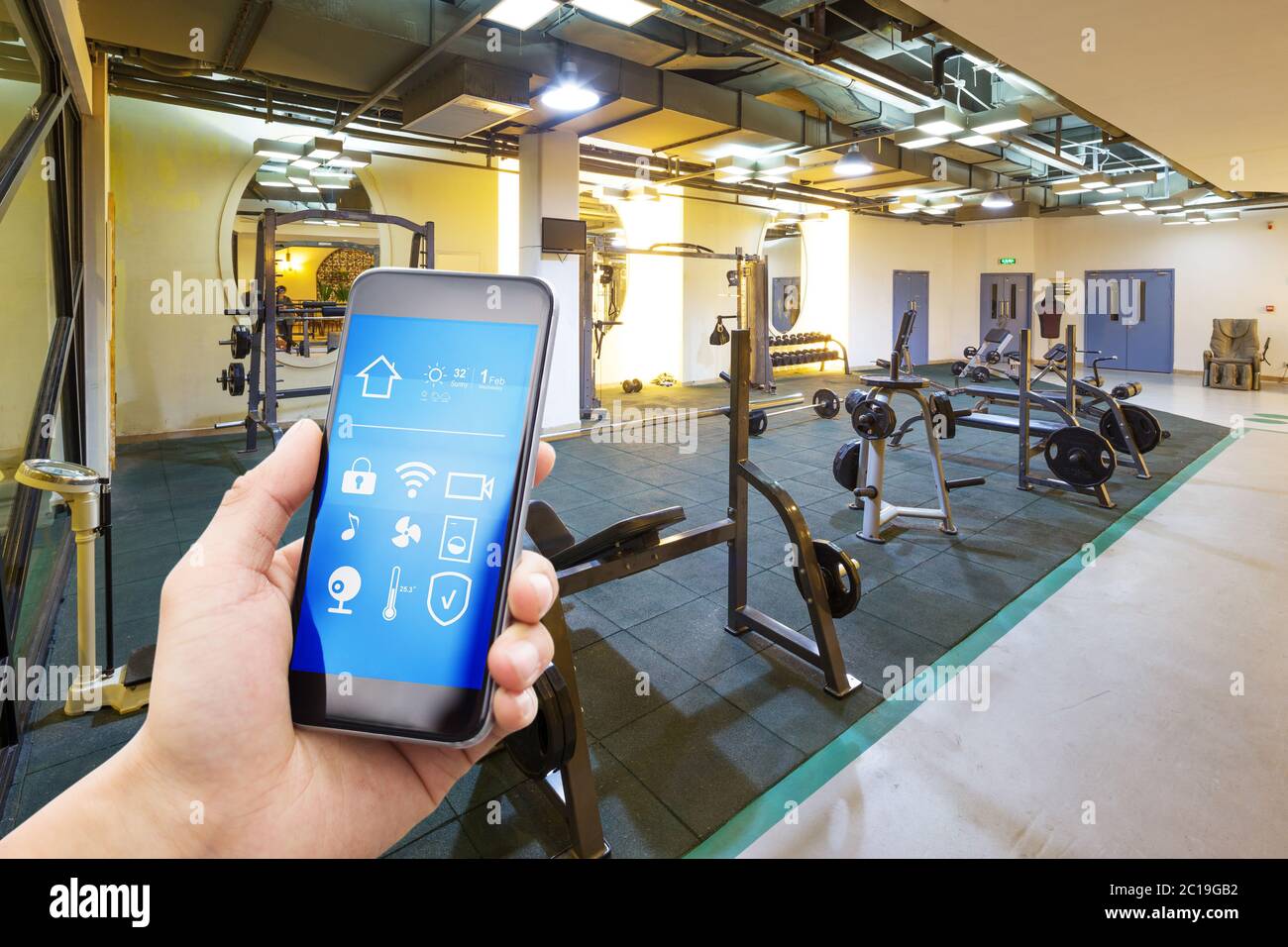 smart phone with smart home with modern gym Stock Photo - Alamy