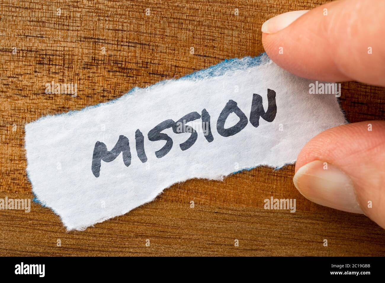 Mission concept and theme written on old paper on a grunge background ...