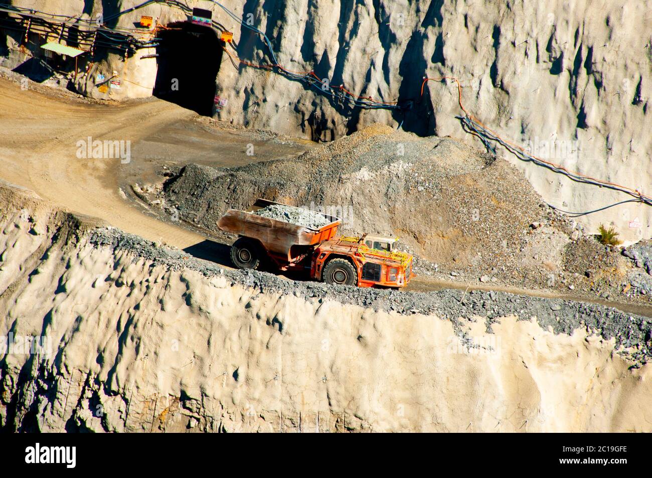 Mining Truck Driving out of Underground Mine Stock Photo - Alamy