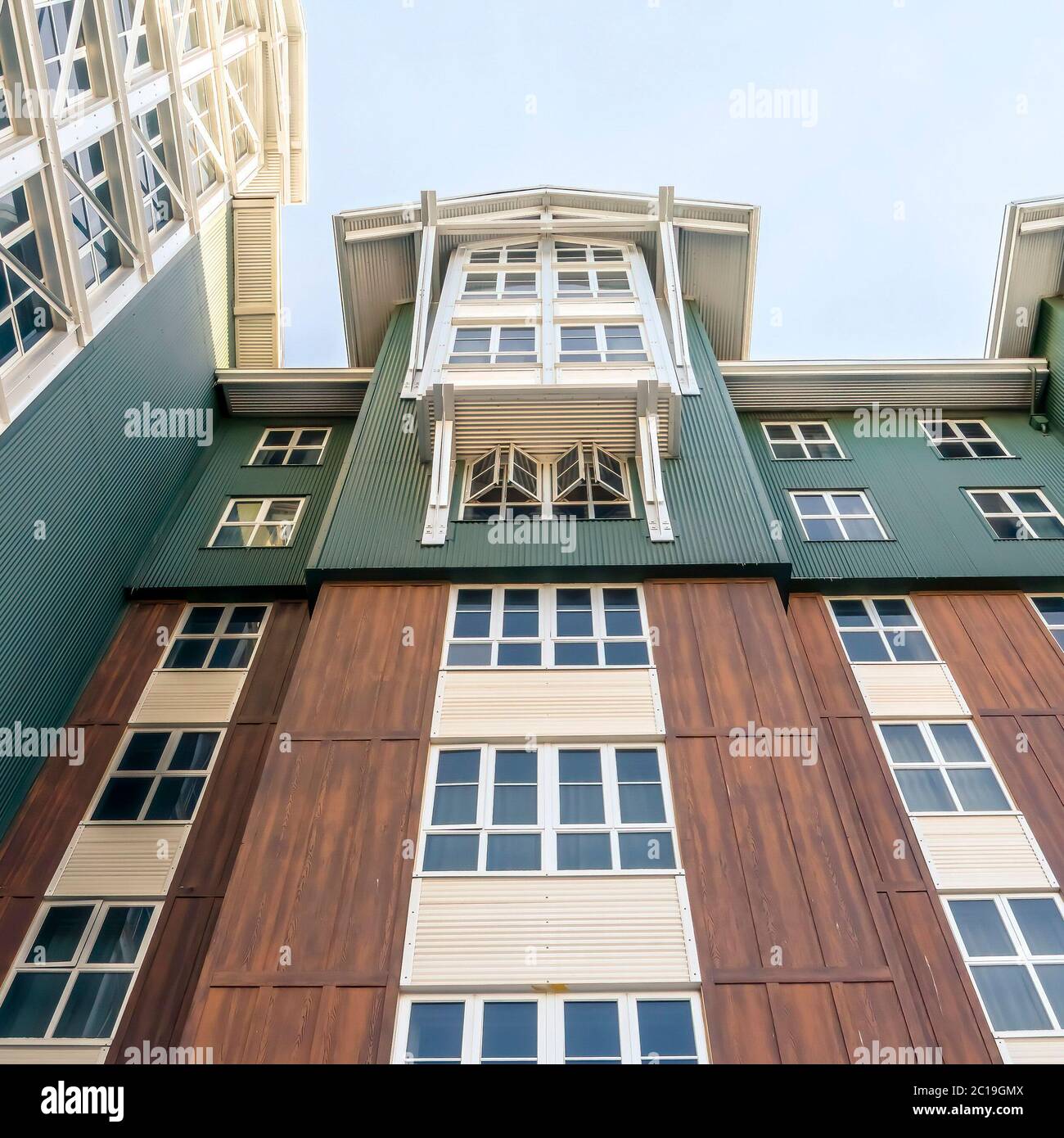 Square Exterior of residential building with cottage pane windows and ...