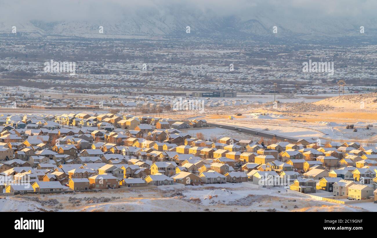 Panorama crop Snowy winter view of houses in scenic Utah Valley ...