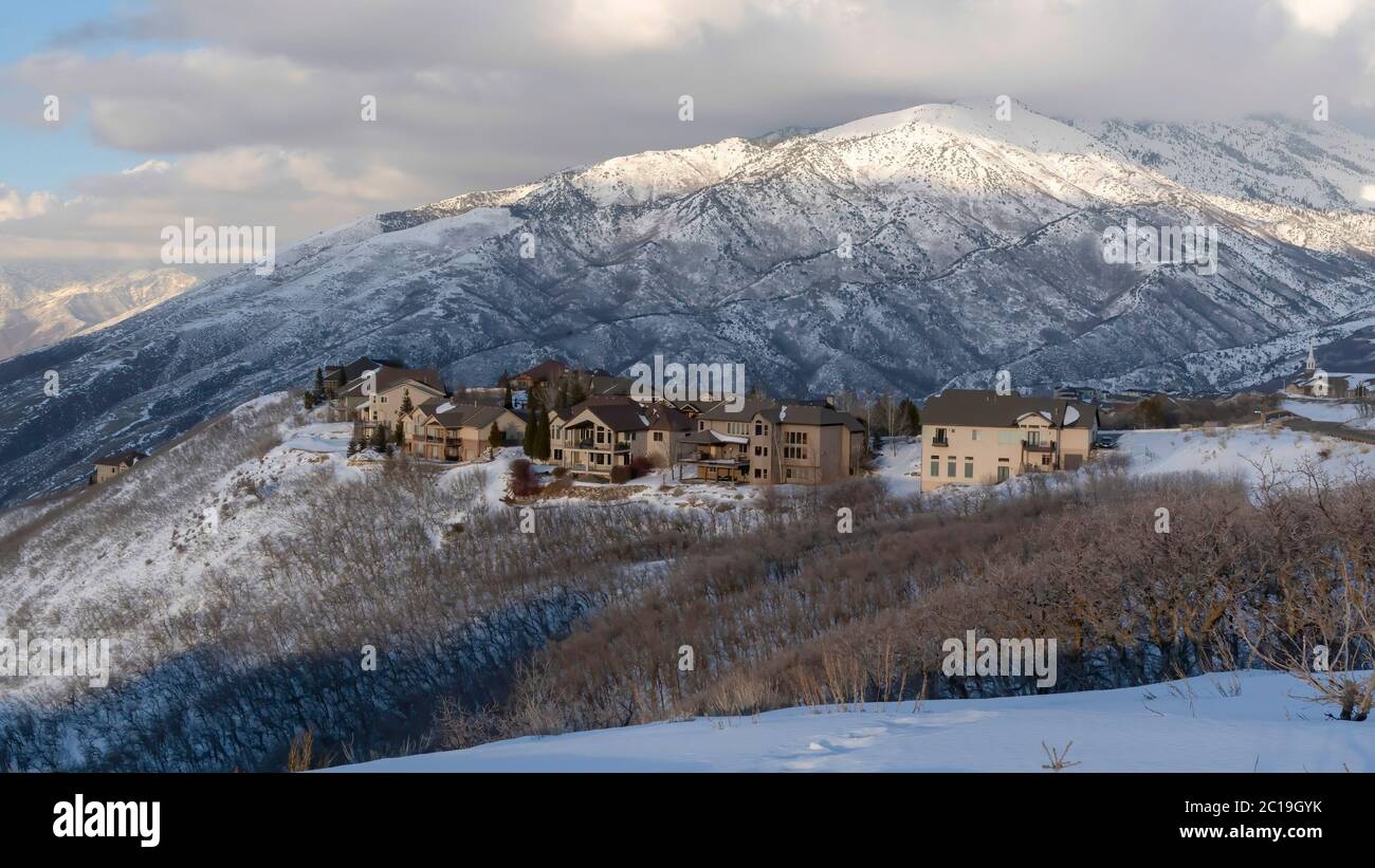 Panorama Pristine landscape of Wasatch Mountains with houses on its ...