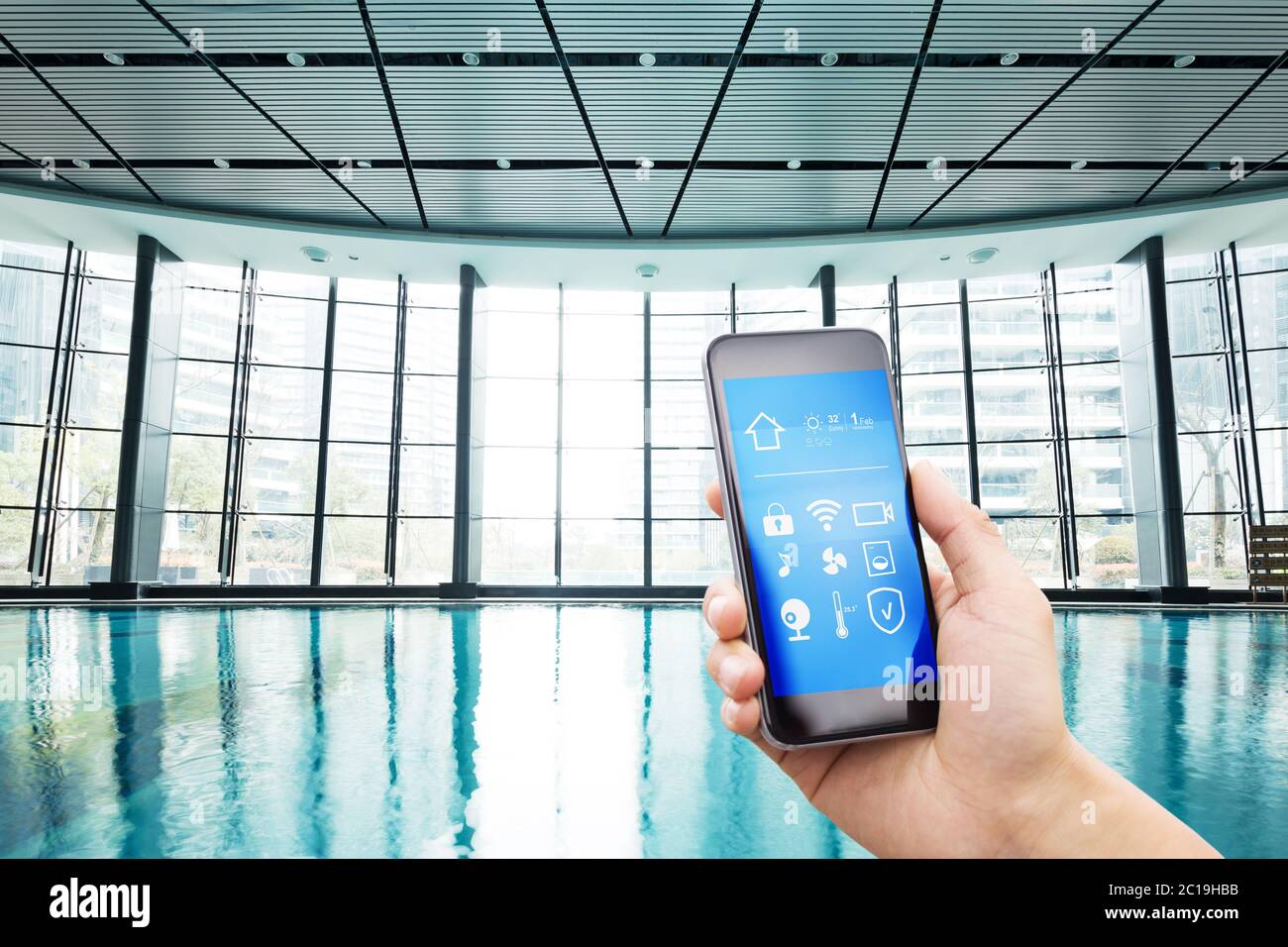 smart phone with smart home with modern swimming pool Stock Photo - Alamy
