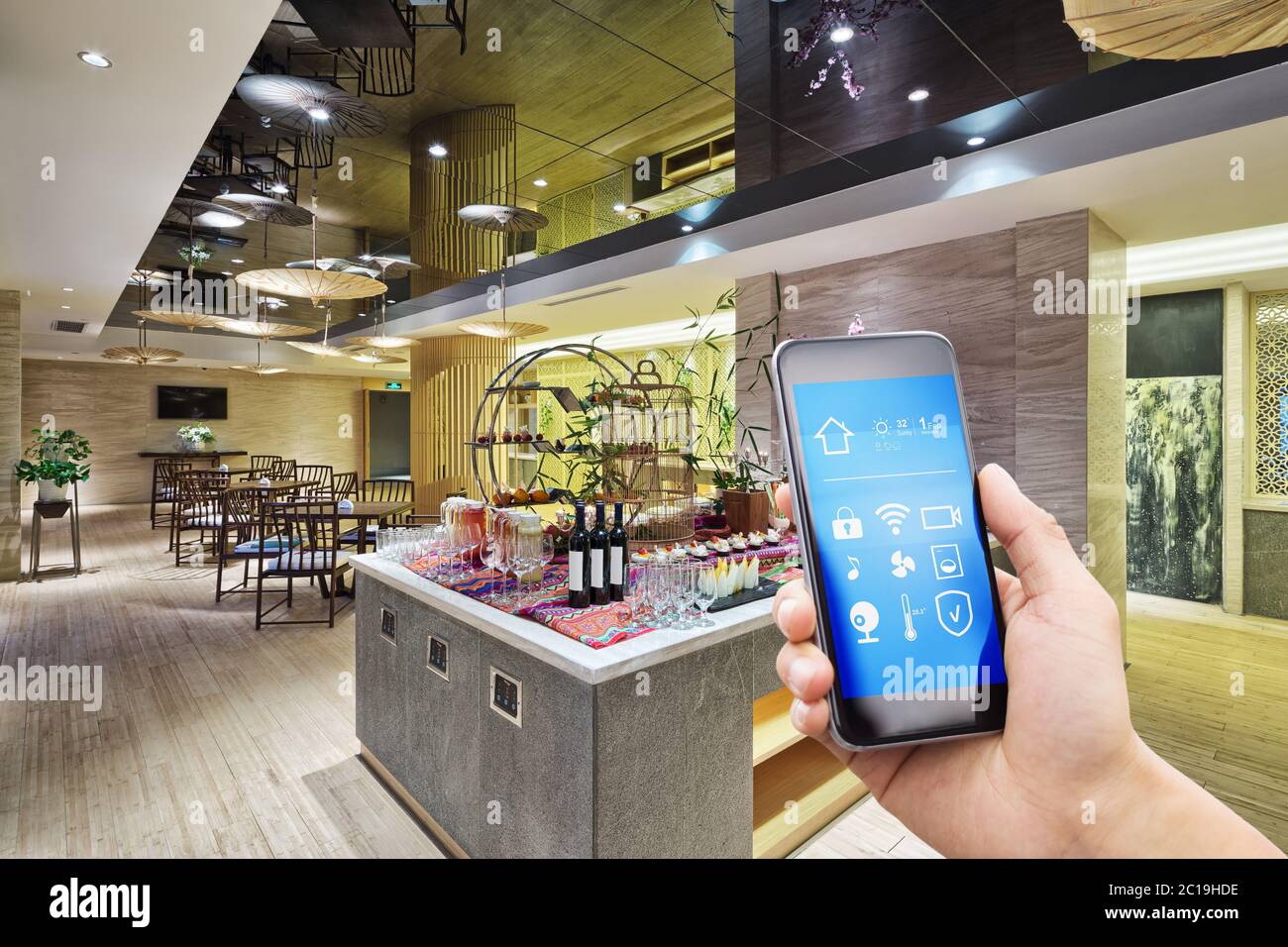 smart phone with smart home with modern dining room Stock Photo - Alamy
