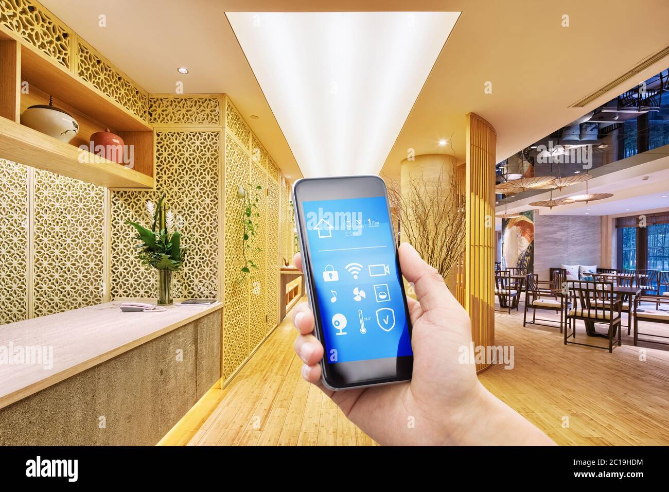 smart phone with smart home with modern dining room Stock Photo - Alamy