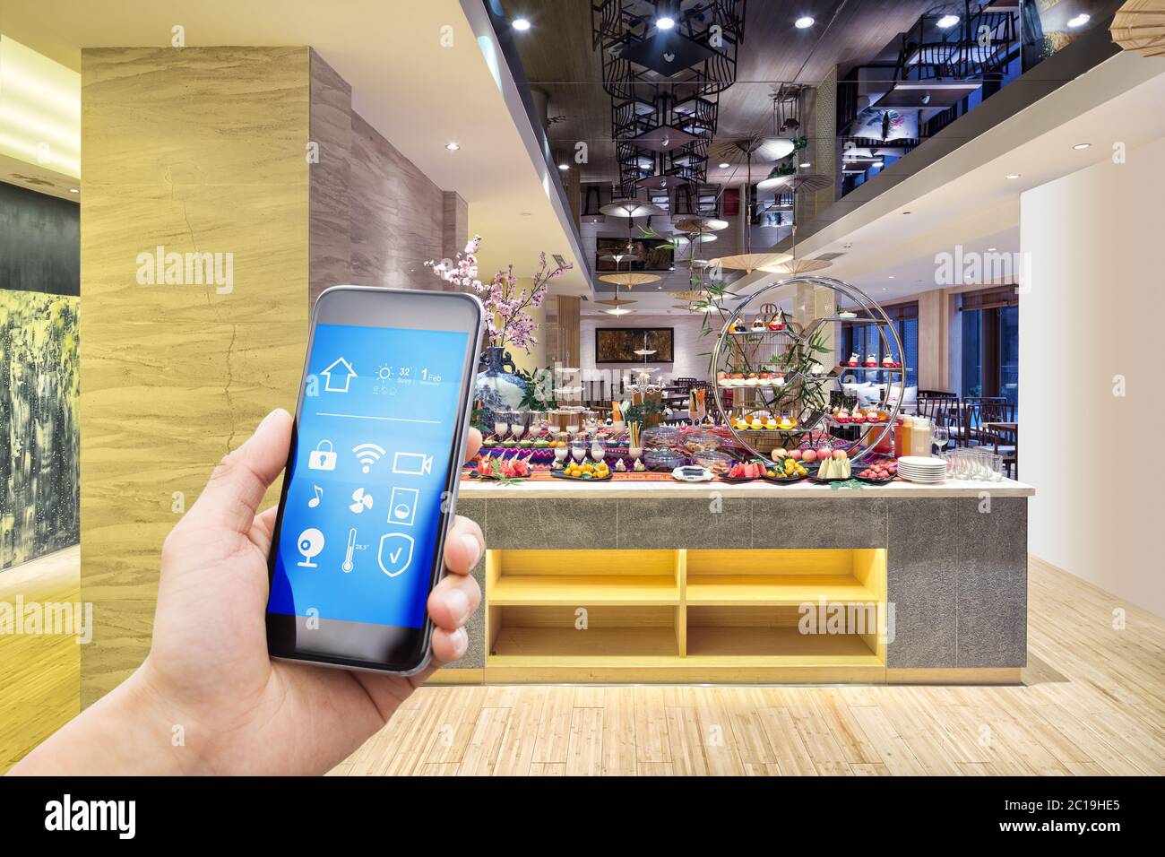 smart phone with smart home with modern dining room Stock Photo - Alamy